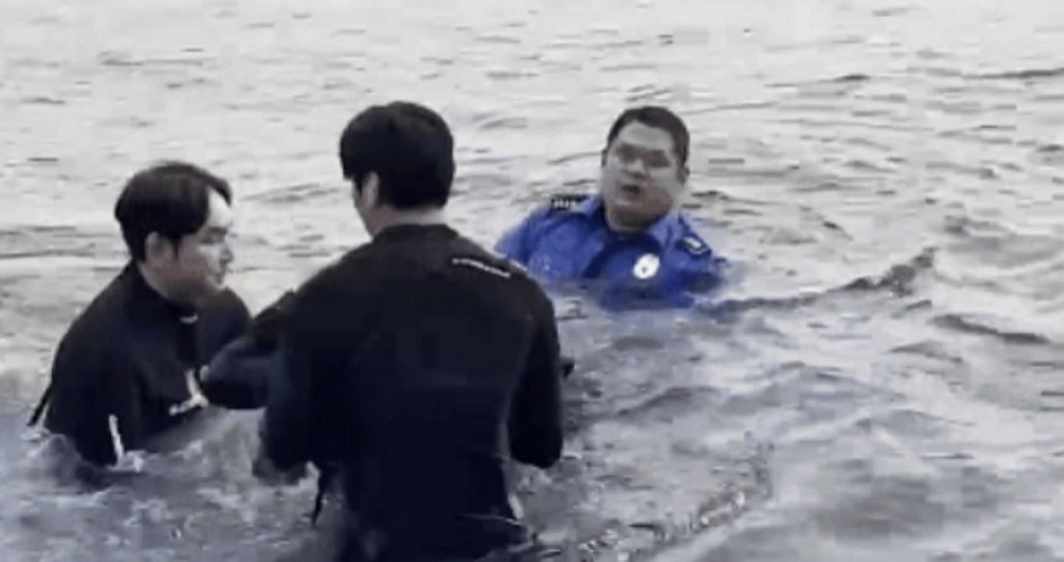 Brave Rescuer Dives into Freezing Waters to Save Stranded Woman